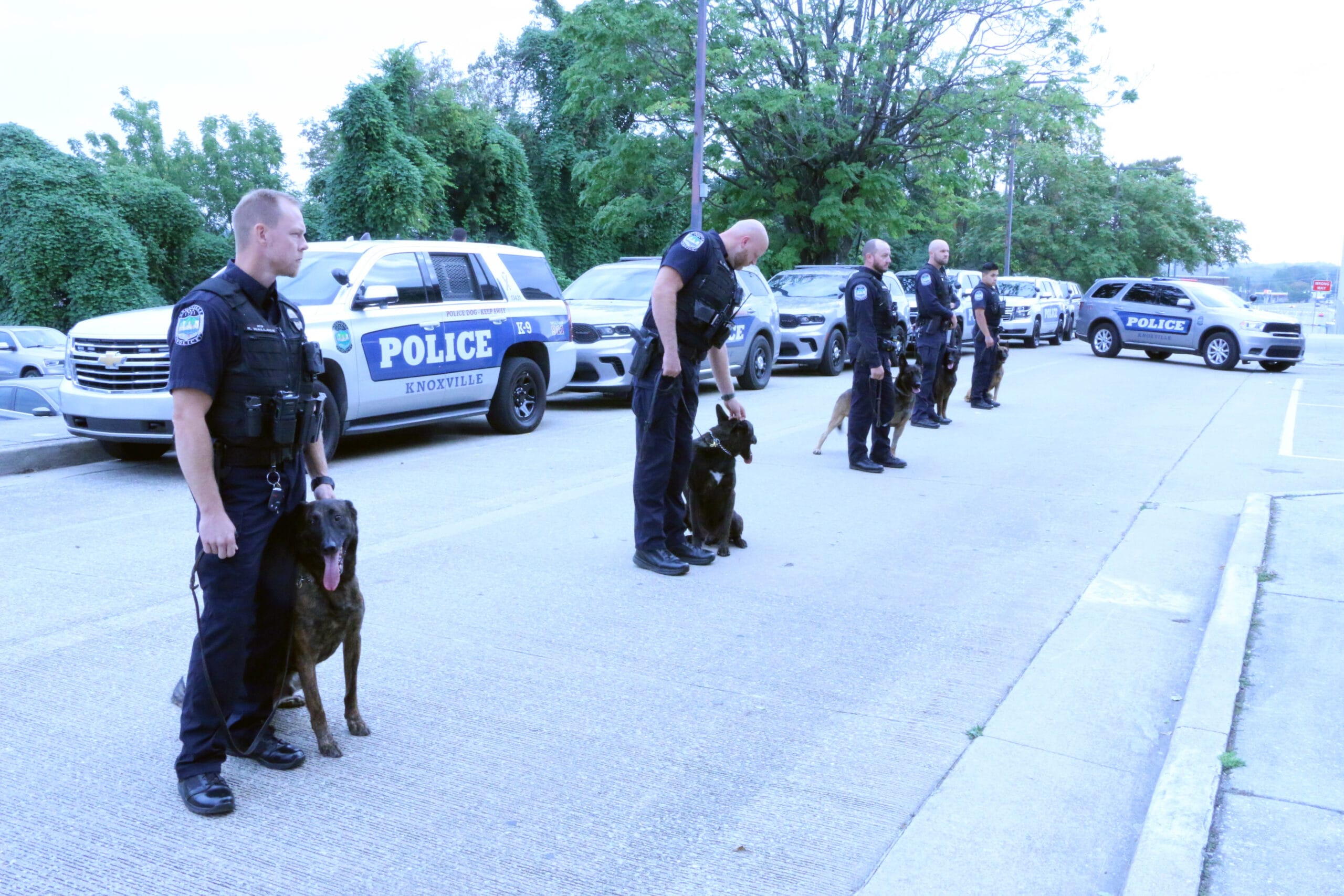 Blessing the officers: man and his best friend | East Tennessee Catholic